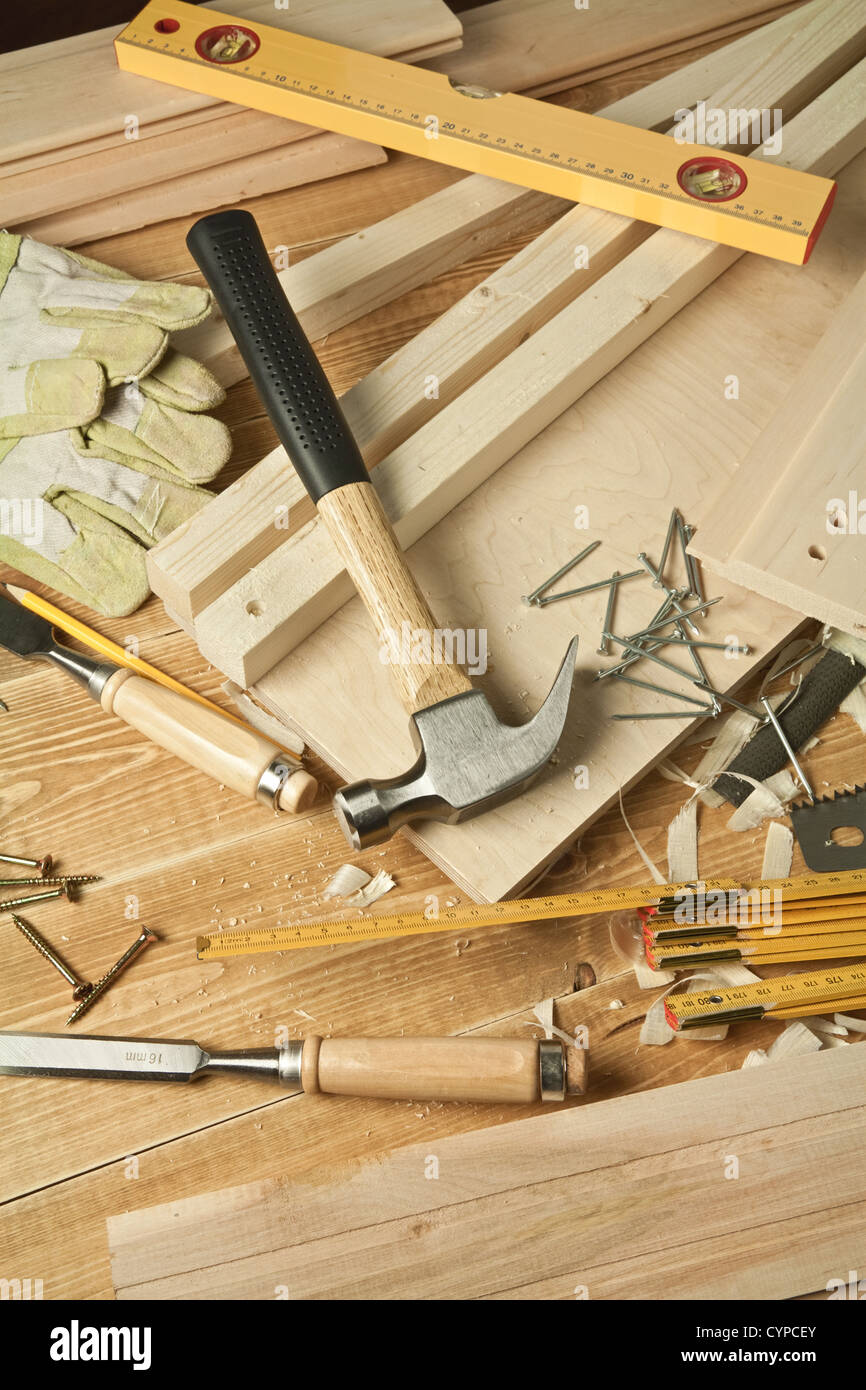 Wooden workshop table with tools Stock Photo - Alamy