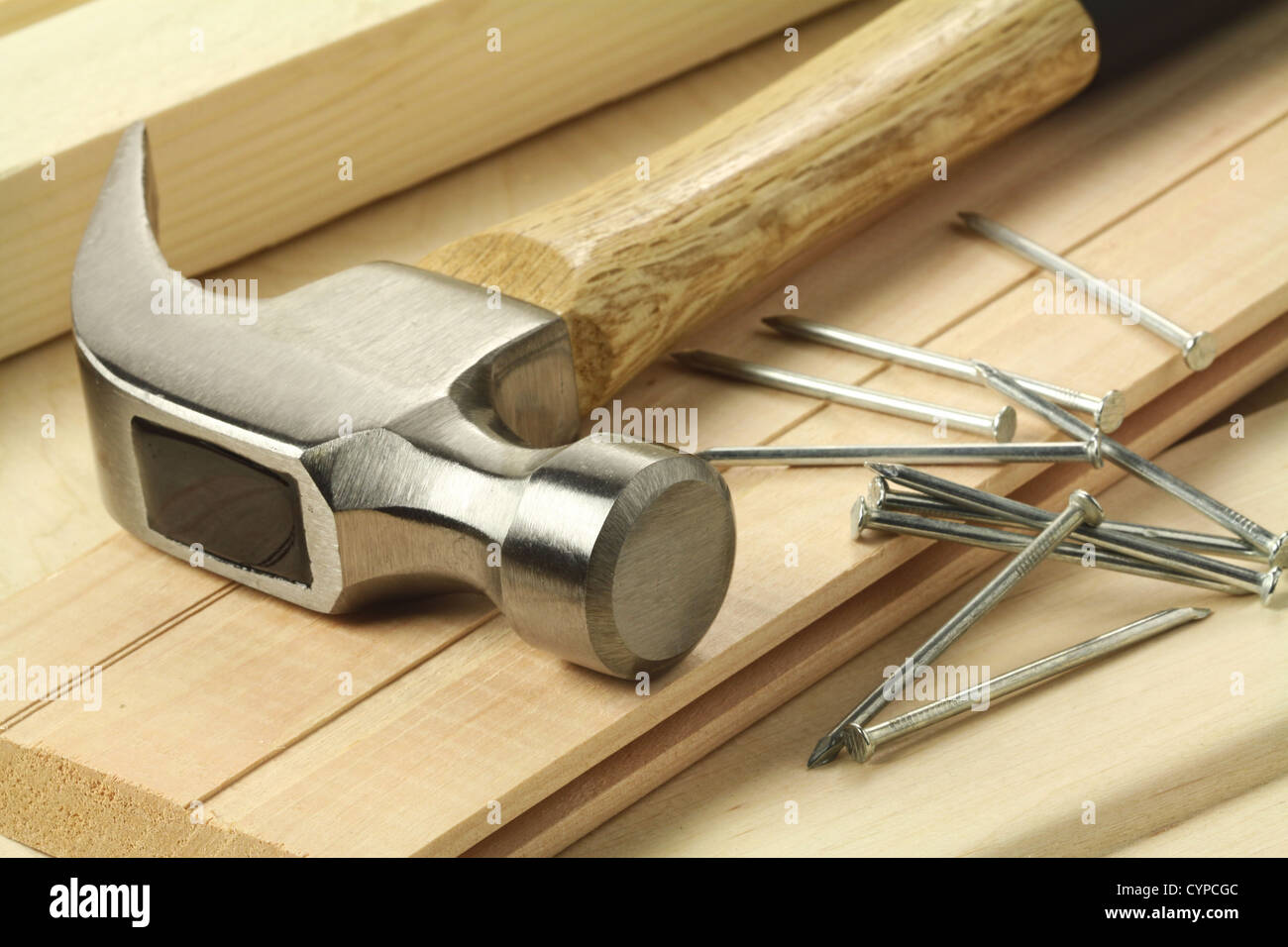 Wooden planks, hammer and nails Stock Photo - Alamy
