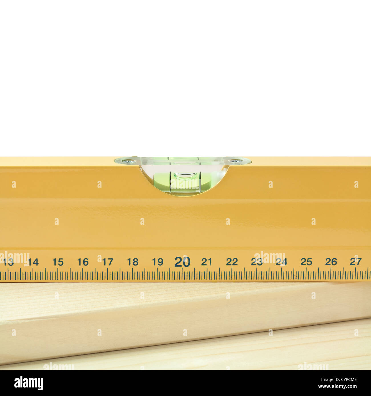 Yellow level tool on wood plank Stock Photo - Alamy
