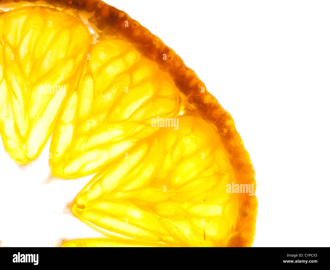 Closeup of a sliced up tangerine backlit Stock Photo - Alamy