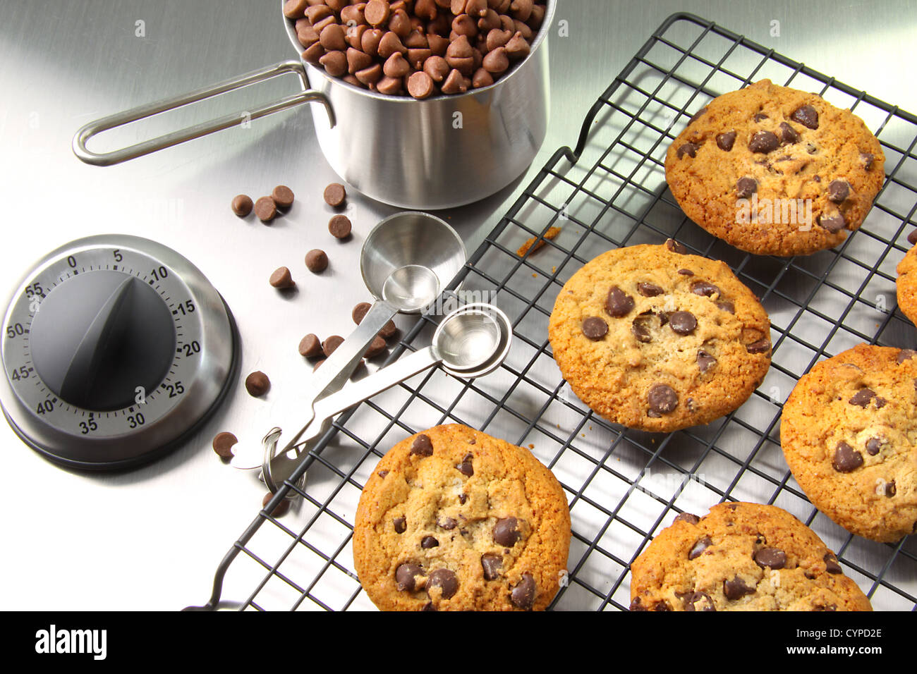Freshly baked chocolate chip cookies on cooling rack Stock Photo - Alamy
