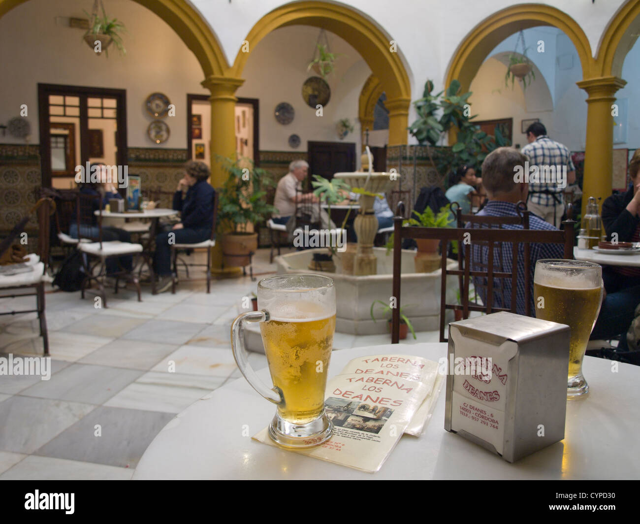 Interior courtyard of Taberna los Deanes in Cordoba Spain with ice cold ...