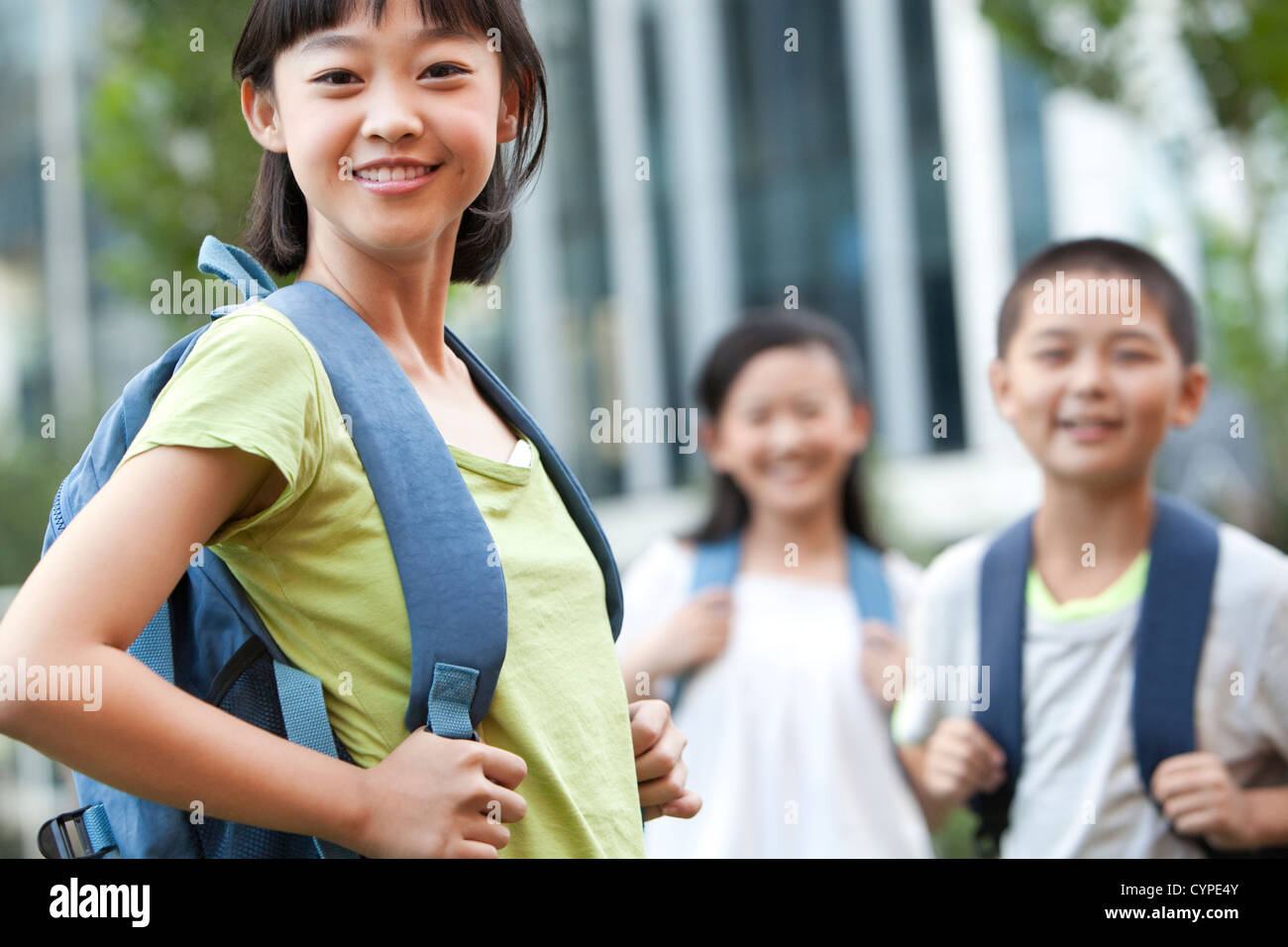 Happy elementary students Stock Photo - Alamy