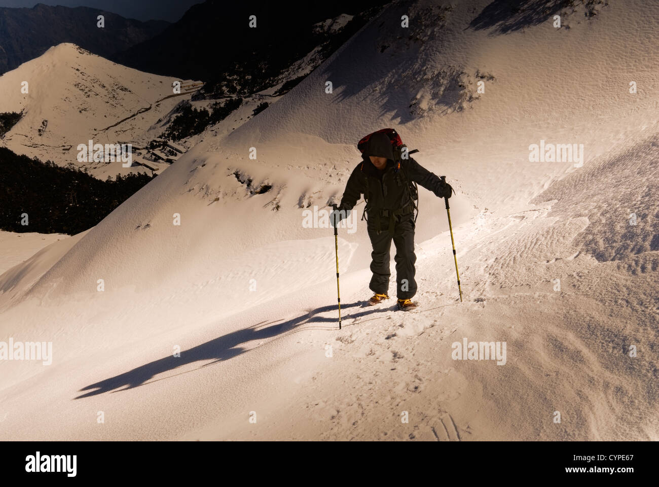 Dramatic scenic of man hiking on sunset mountain path Stock Photo - Alamy