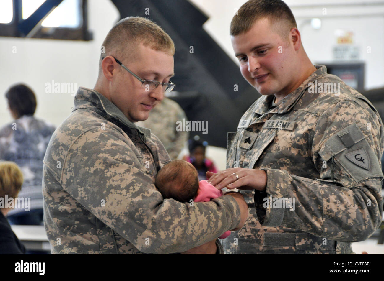 Holds his 8 day old daughter hi-res stock photography and images - Alamy