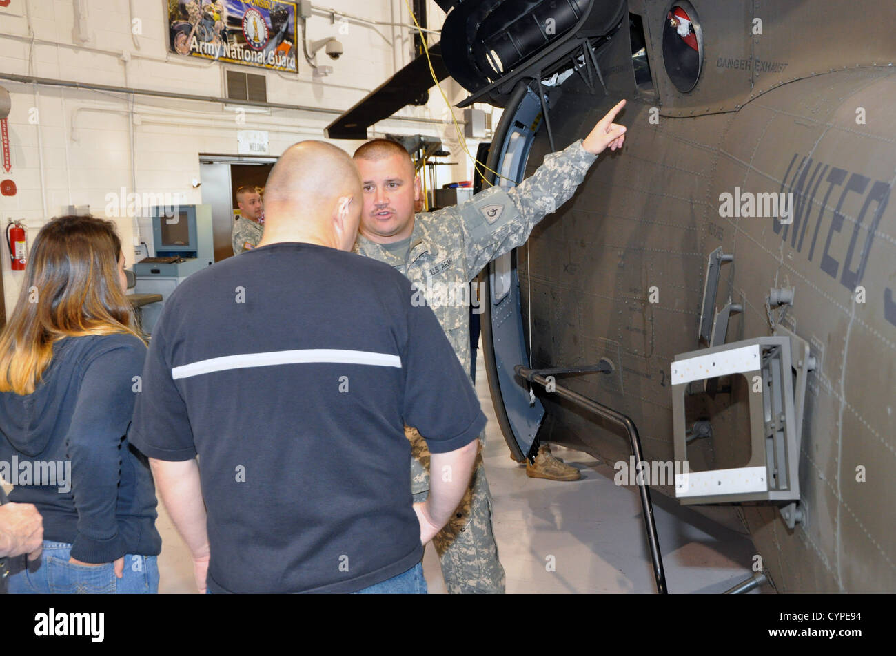 Indiana National Guard Spc. Eric Pugh demonstrates the UH-60 Black Hawk ...