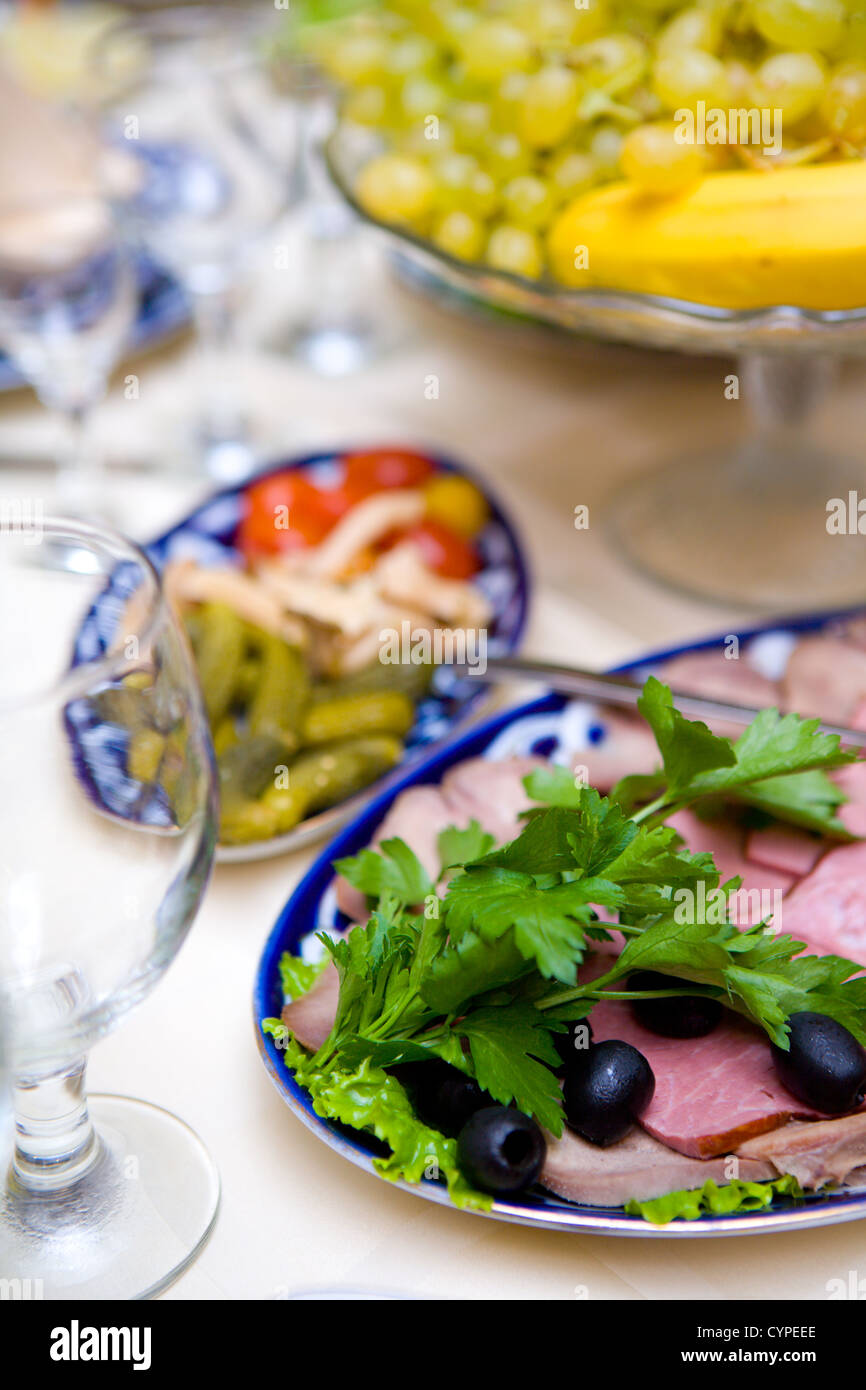 Cafe table with plenty of food on it Stock Photo - Alamy