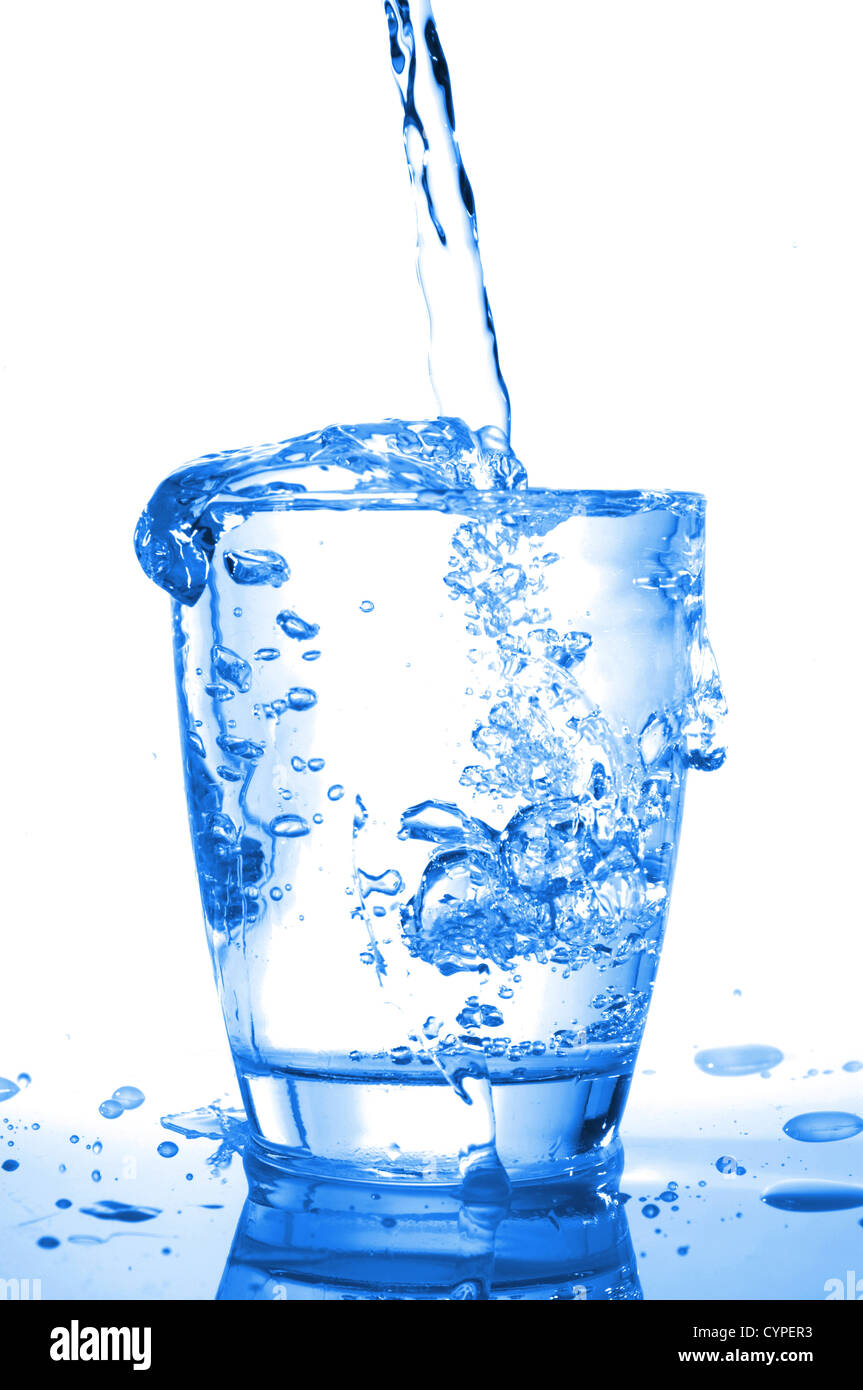 lifestyle concept with glass of pouring cold water Stock Photo - Alamy