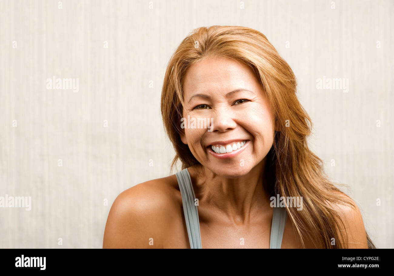 Pretty ethnic woman with an easy smile Stock Photo - Alamy