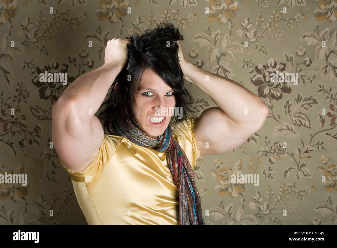 Frustrated Muscular Young Man Pulling Out His Black hair Stock Photo ...