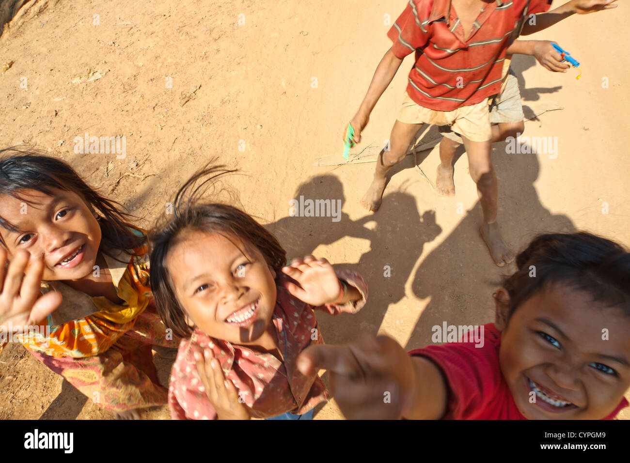Happy Children in the Streets of the Village Kampong Khleang in the ...