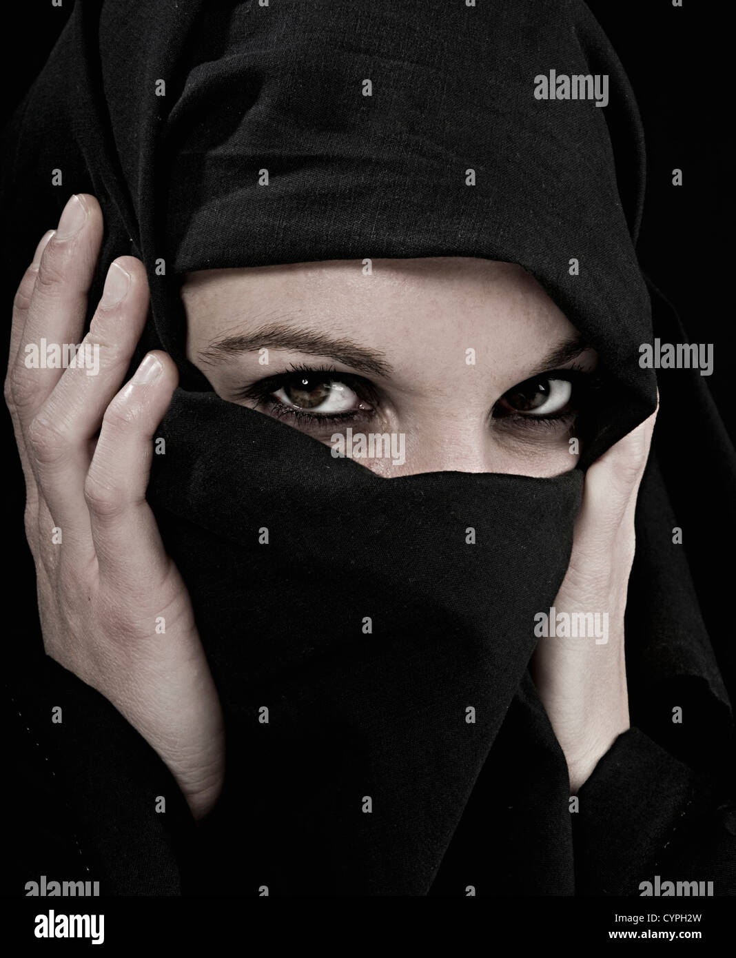 Young woman wearing burka black hi-res stock photography and images - Alamy