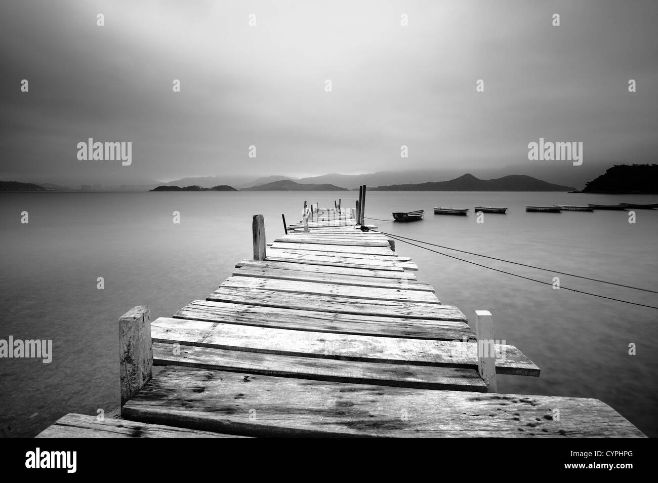 Looking over a pier and a boat Black and White Stock Photos & Images ...