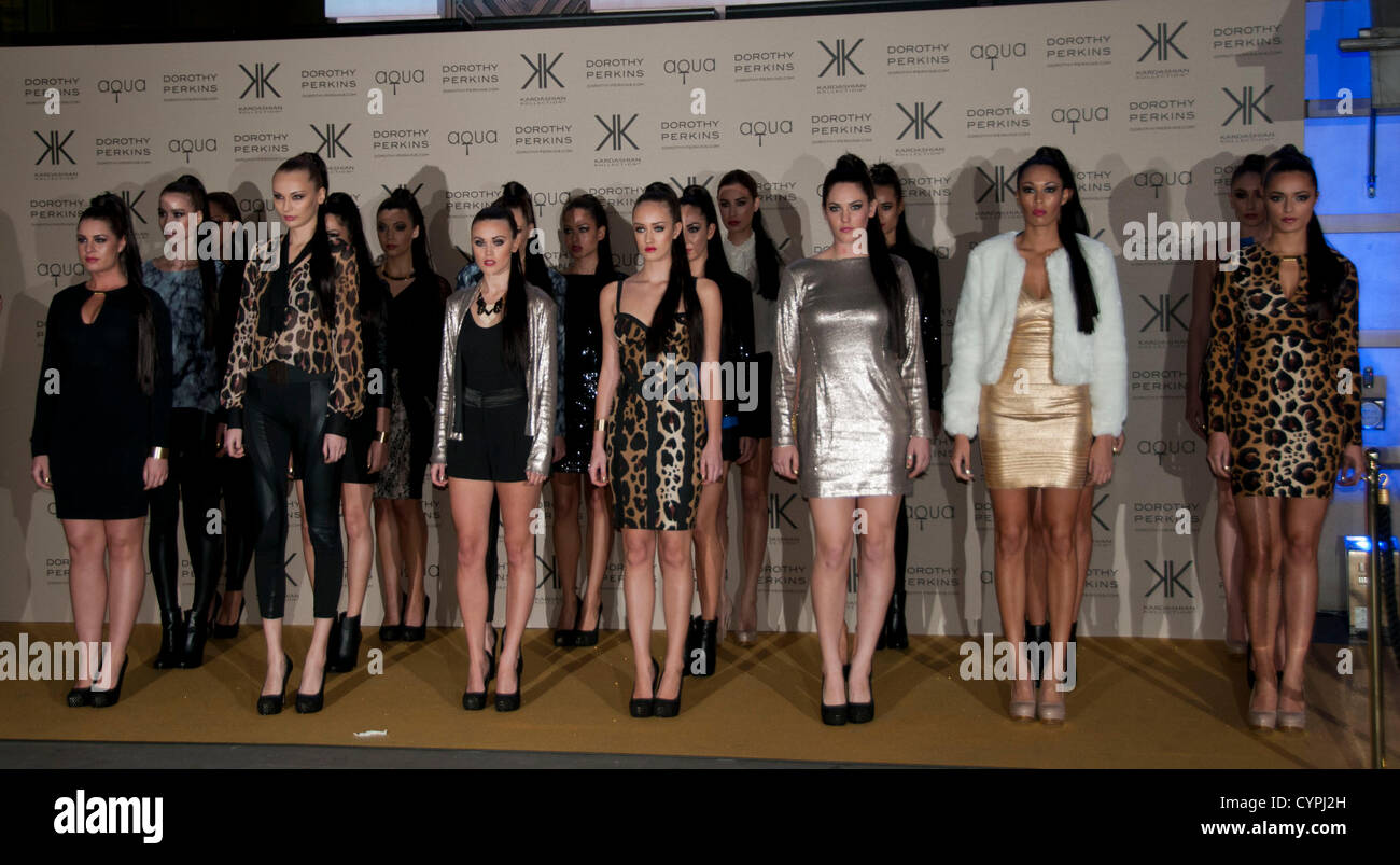 London, UK. 08/11/12. Models line up to show off the dresses at the ...
