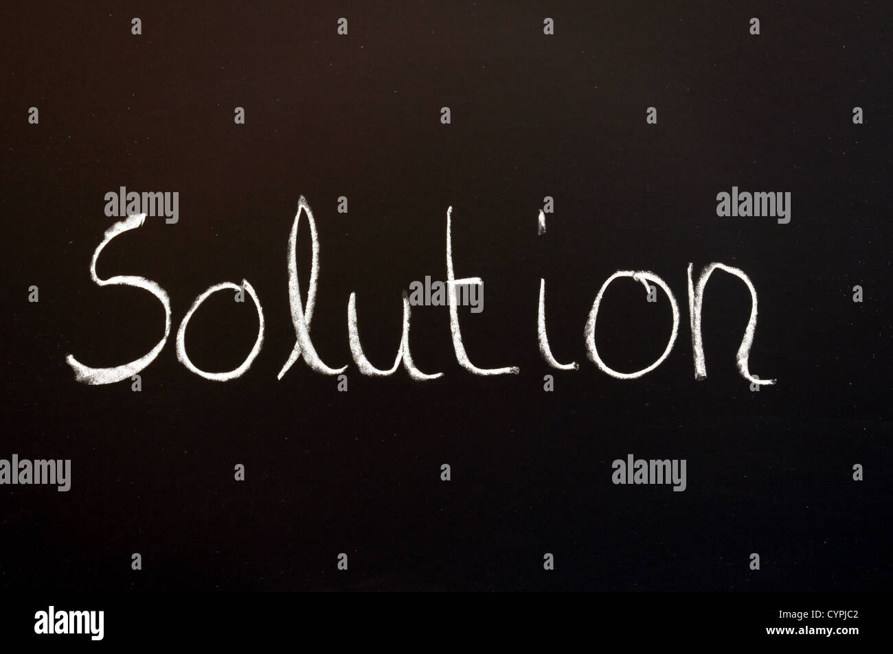 solution for a problem written on a chalk or black board Stock Photo ...