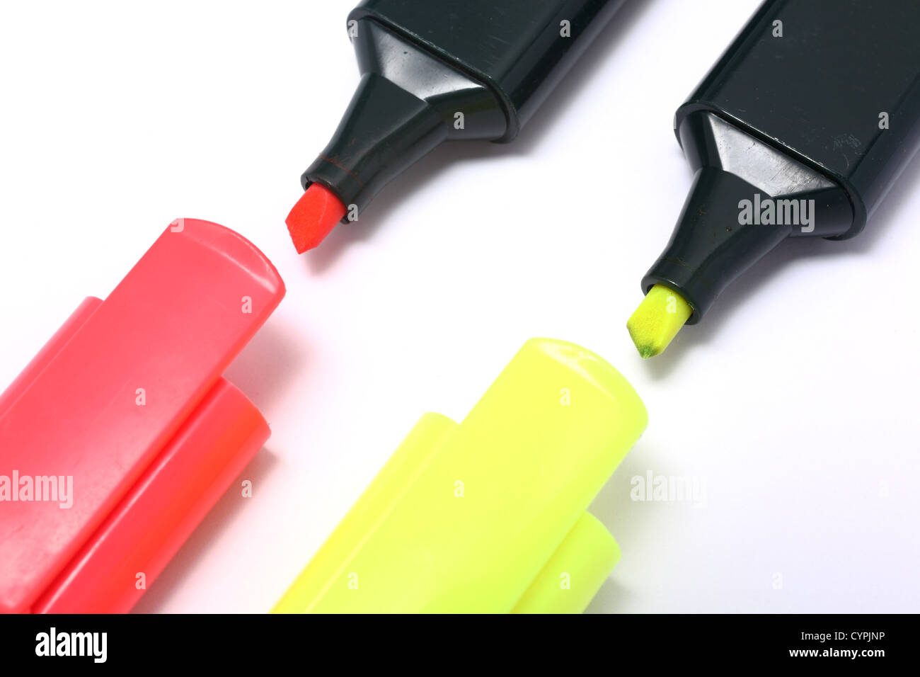 fluorescent markers on white background Stock Photo - Alamy