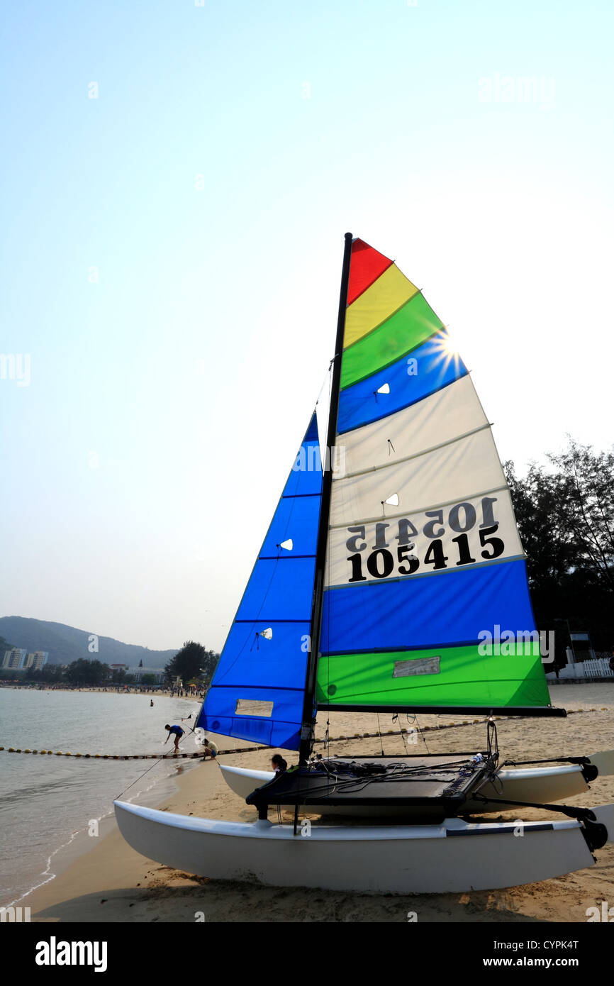 Sailboat on beach Stock Photo - Alamy