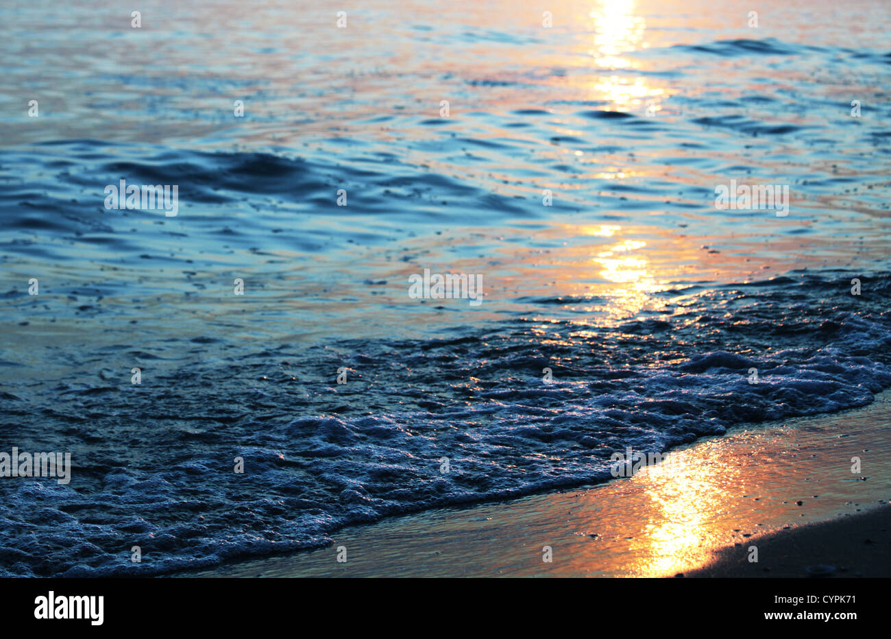 Wave on the beach Stock Photo - Alamy