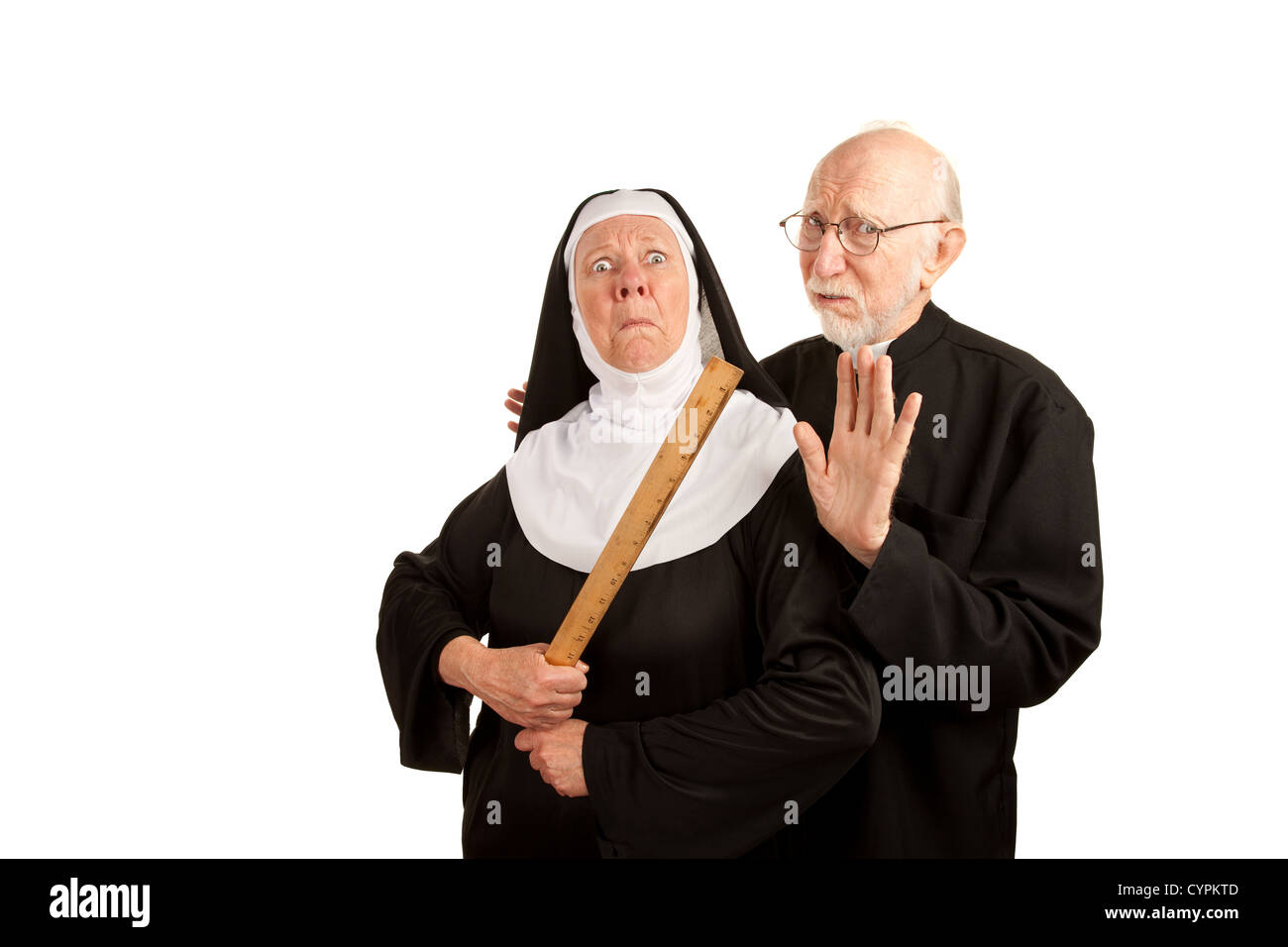 Funny priest warning about angry nun with ruler as weapon Stock Photo ...