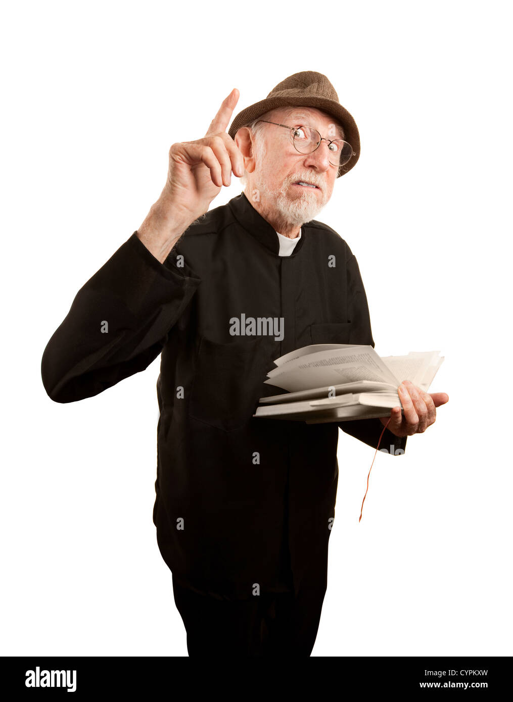 Senior priest or pastor giving a fiery sermon from the Bible Stock ...