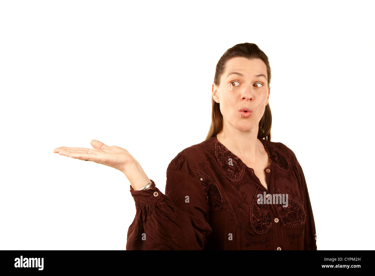 Woman gesturing to her side with the palm of her hand Stock Photo - Alamy