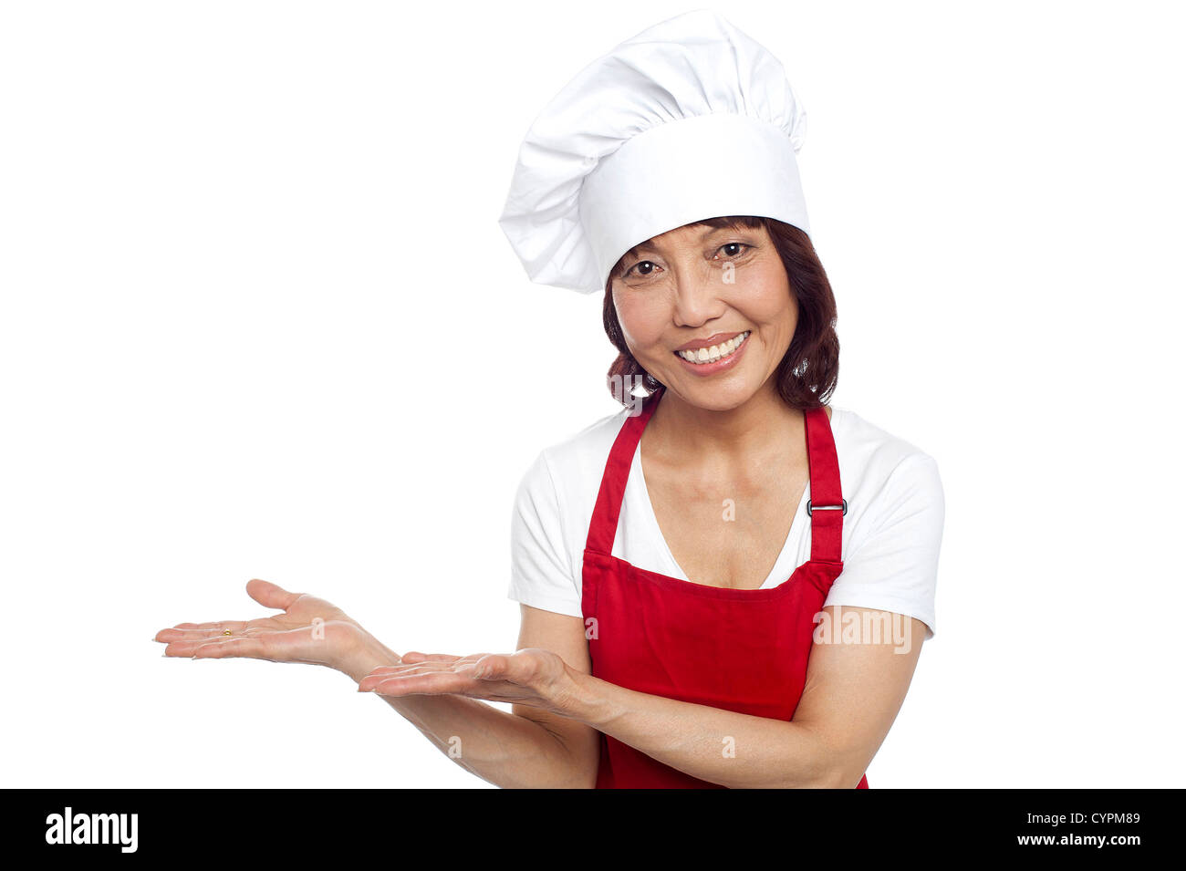 Smiling asian chef gesturing guests to take their seats. All on white ...