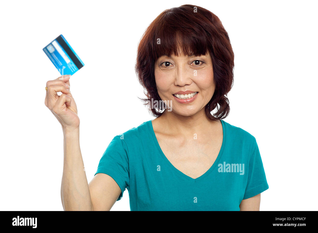 Beautiful woman holding her credit card out isolated over white Stock ...
