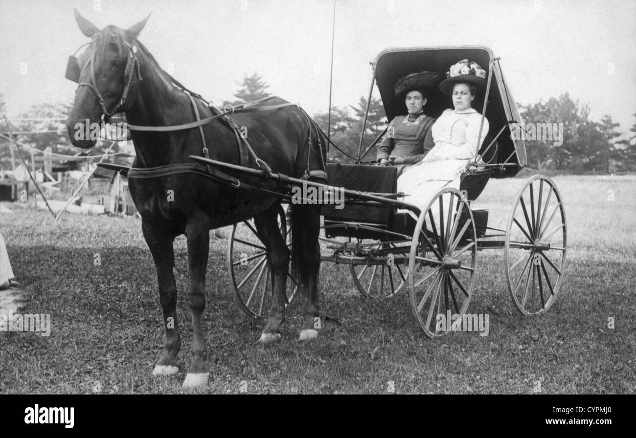 Two Women in a Horse-Drawn Buggy, 1910 Stock Photo - Alamy