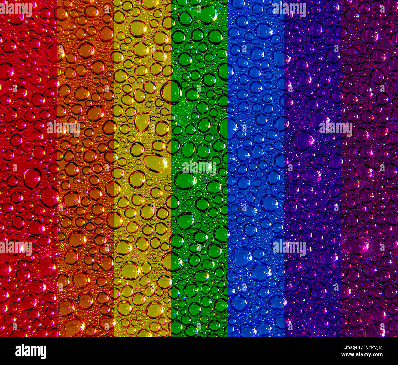 Condensed water droplets on a rainbow background Stock Photo - Alamy