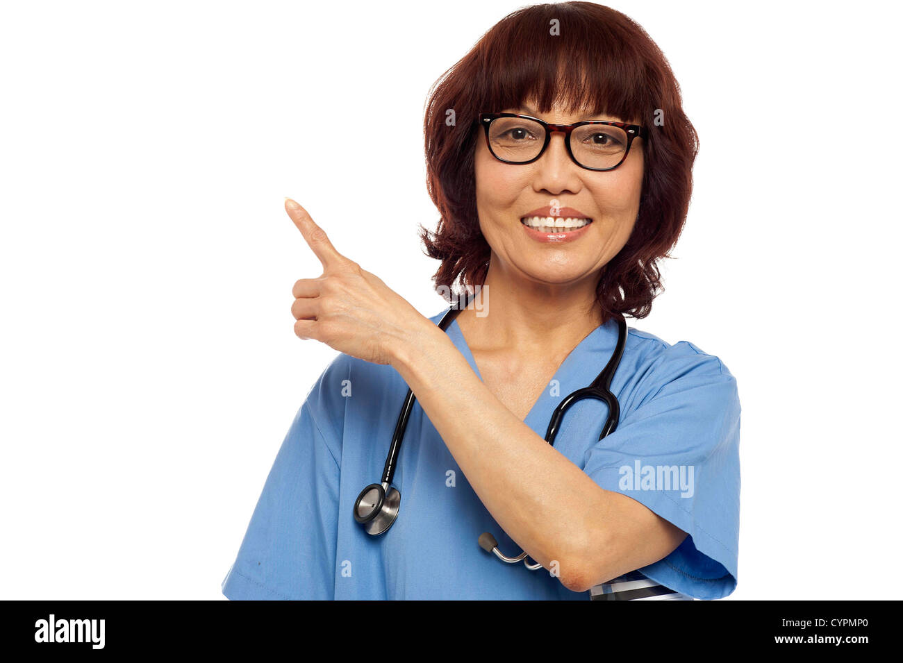 Asian nurse pointing at the copy space. All on white background Stock ...