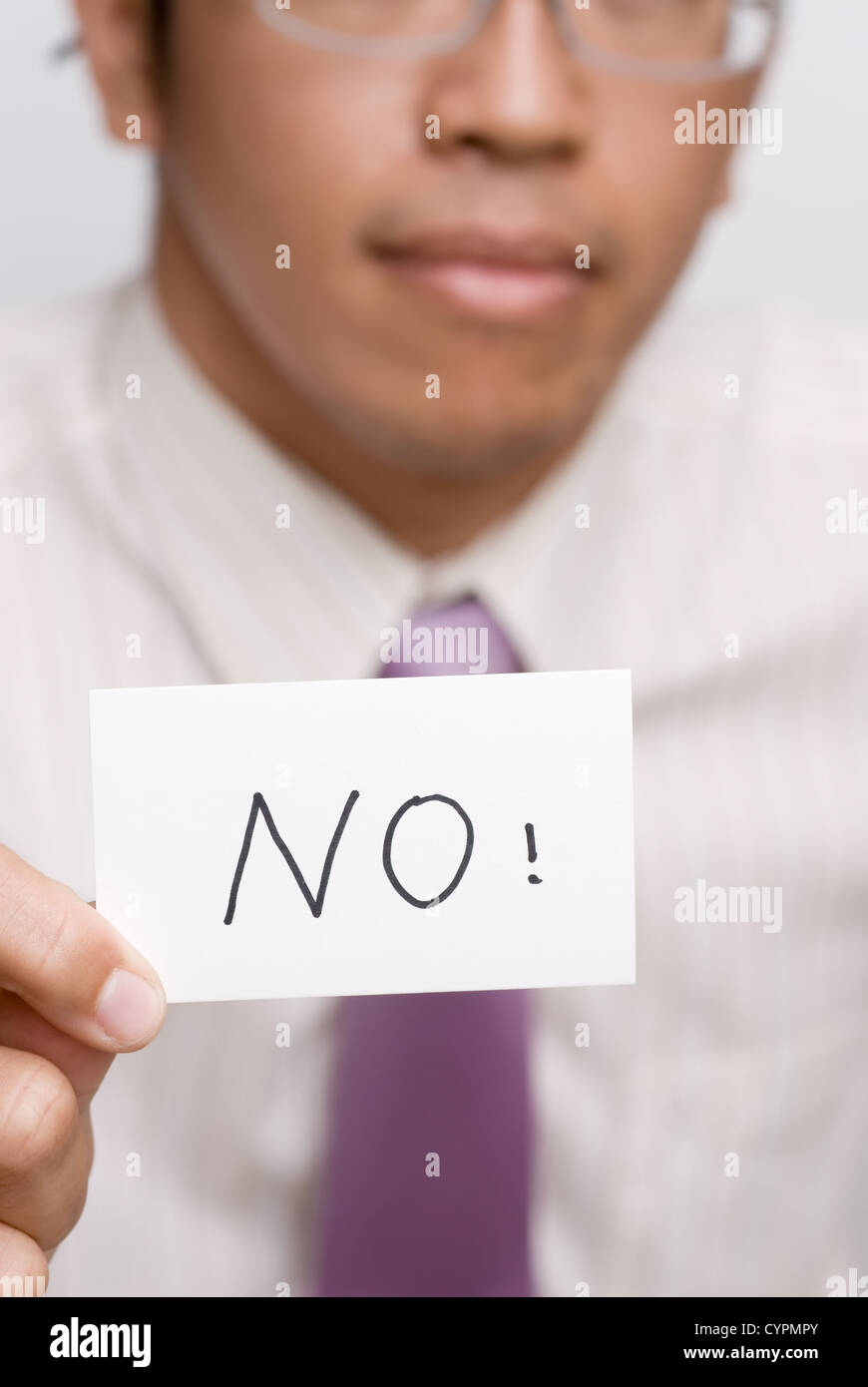 Business man show no card on white background Stock Photo - Alamy