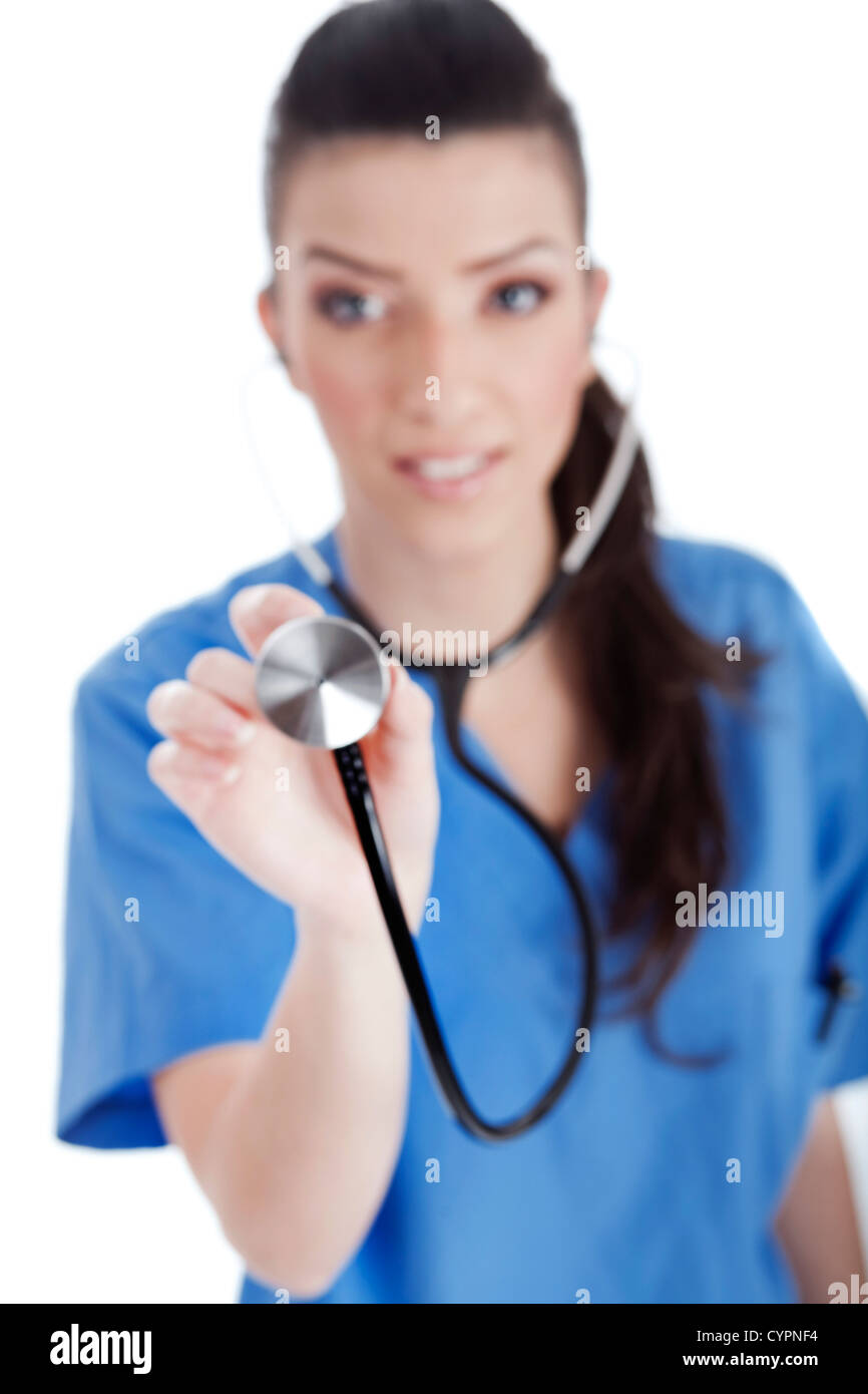 Blurred image of the nurse holding stethoscope over white background ...