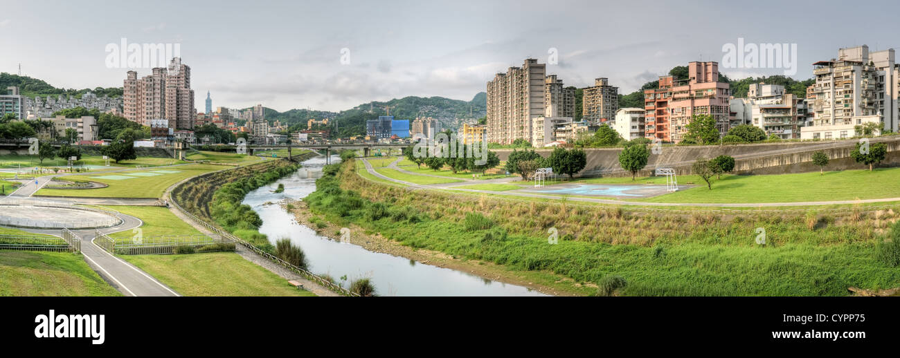 Panoramic cityscape of park with river and buildings in Taipei, Taiwan ...