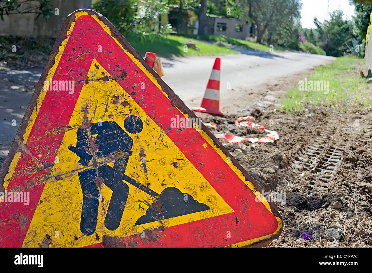 work in progress road sign in a country road Stock Photo - Alamy