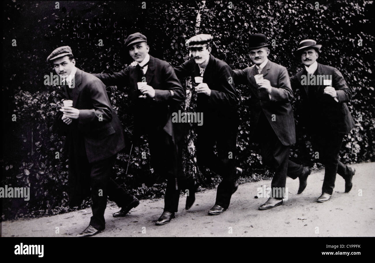 Five Men Holding Beer Glasses While Walking Single File With Hands ...