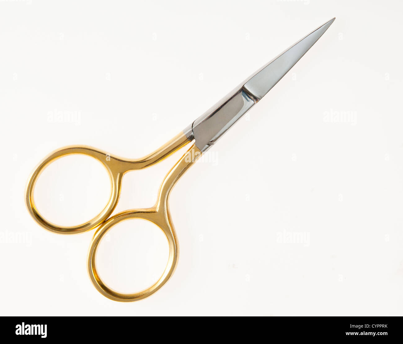 Small scissors for trimming hairs Stock Photo - Alamy
