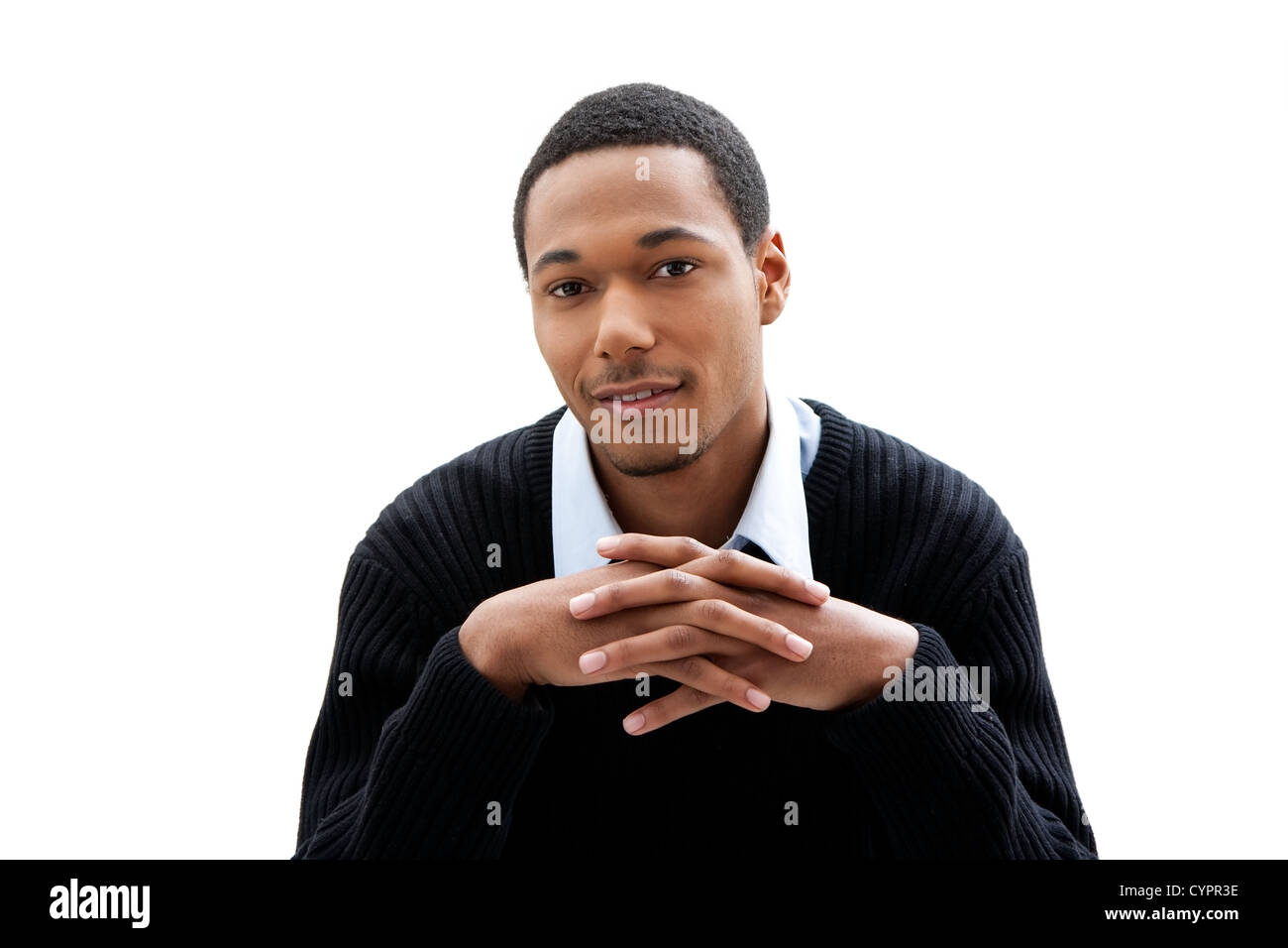 Handsome African American male in blue shirt and black sweater ...