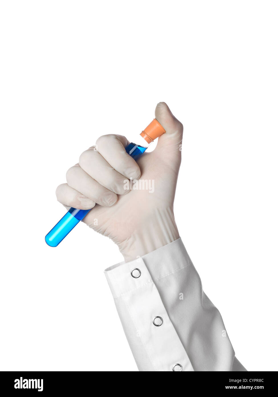 A doctor's hand holds a test tube pressing the cap on with his thumb ...