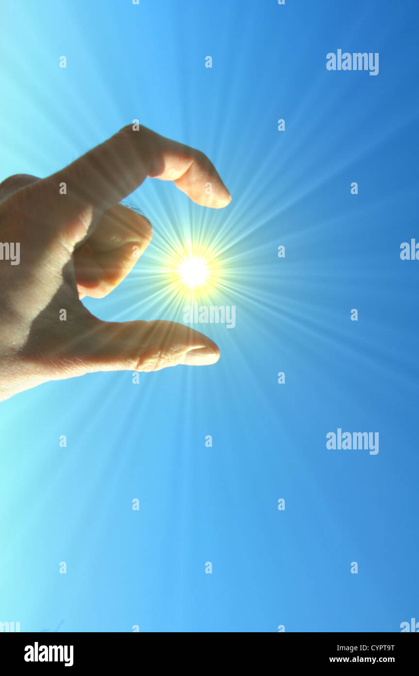 hand finger sky and sun showing freedom concept Stock Photo - Alamy