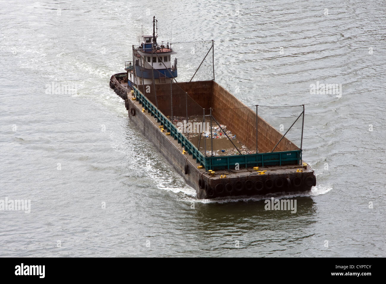 Garbage ship hi-res stock photography and images - Alamy