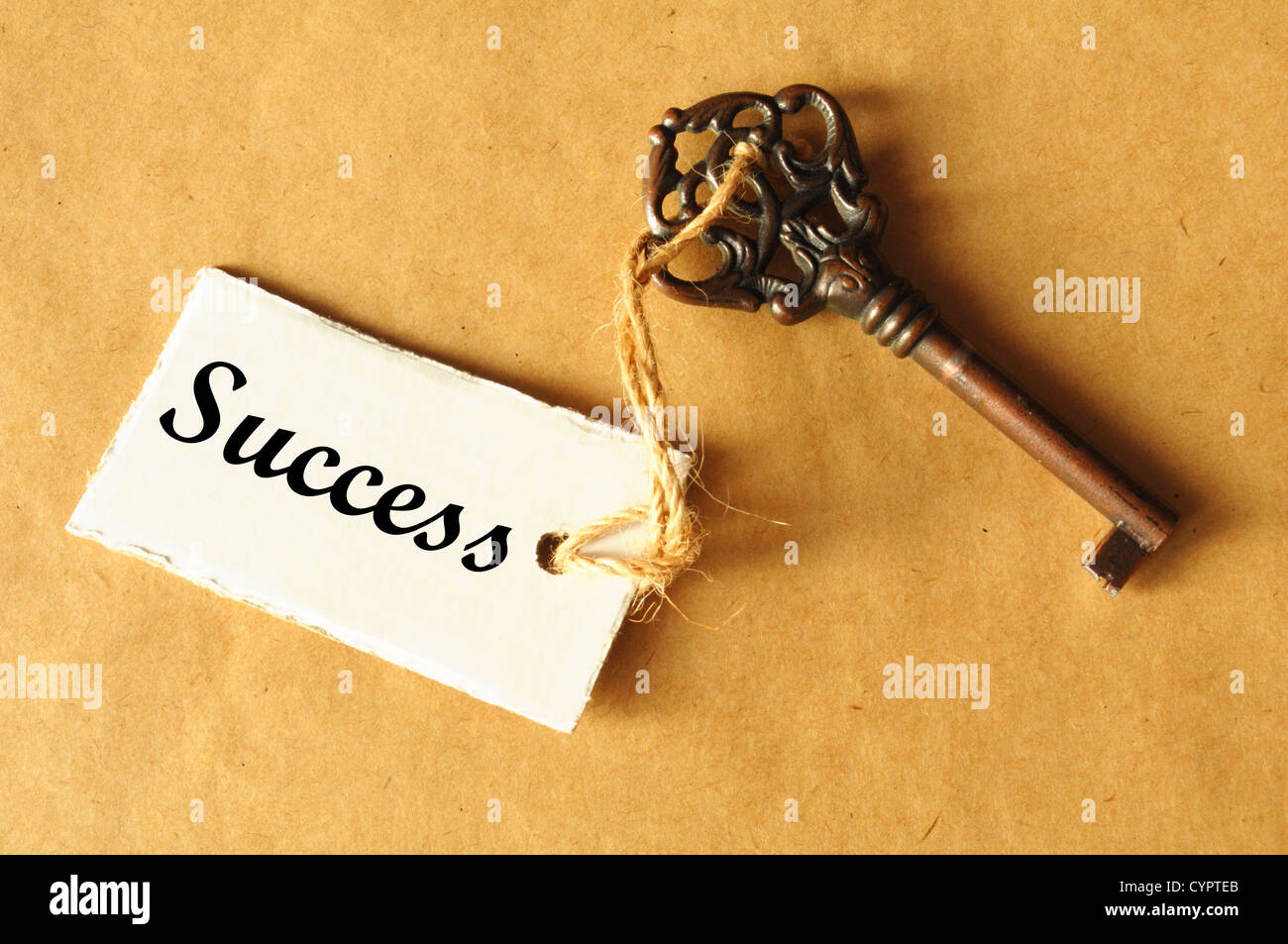 old key to success concept with label or tag Stock Photo - Alamy