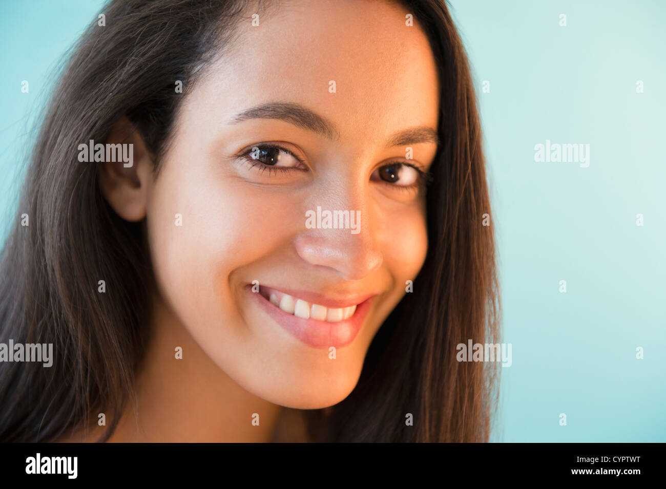 Smiling Hispanic teenager Stock Photo - Alamy