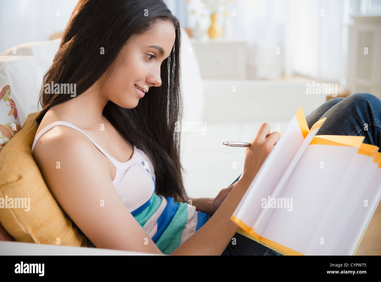 Hispanic homework girl side view hi-res stock photography and images ...
