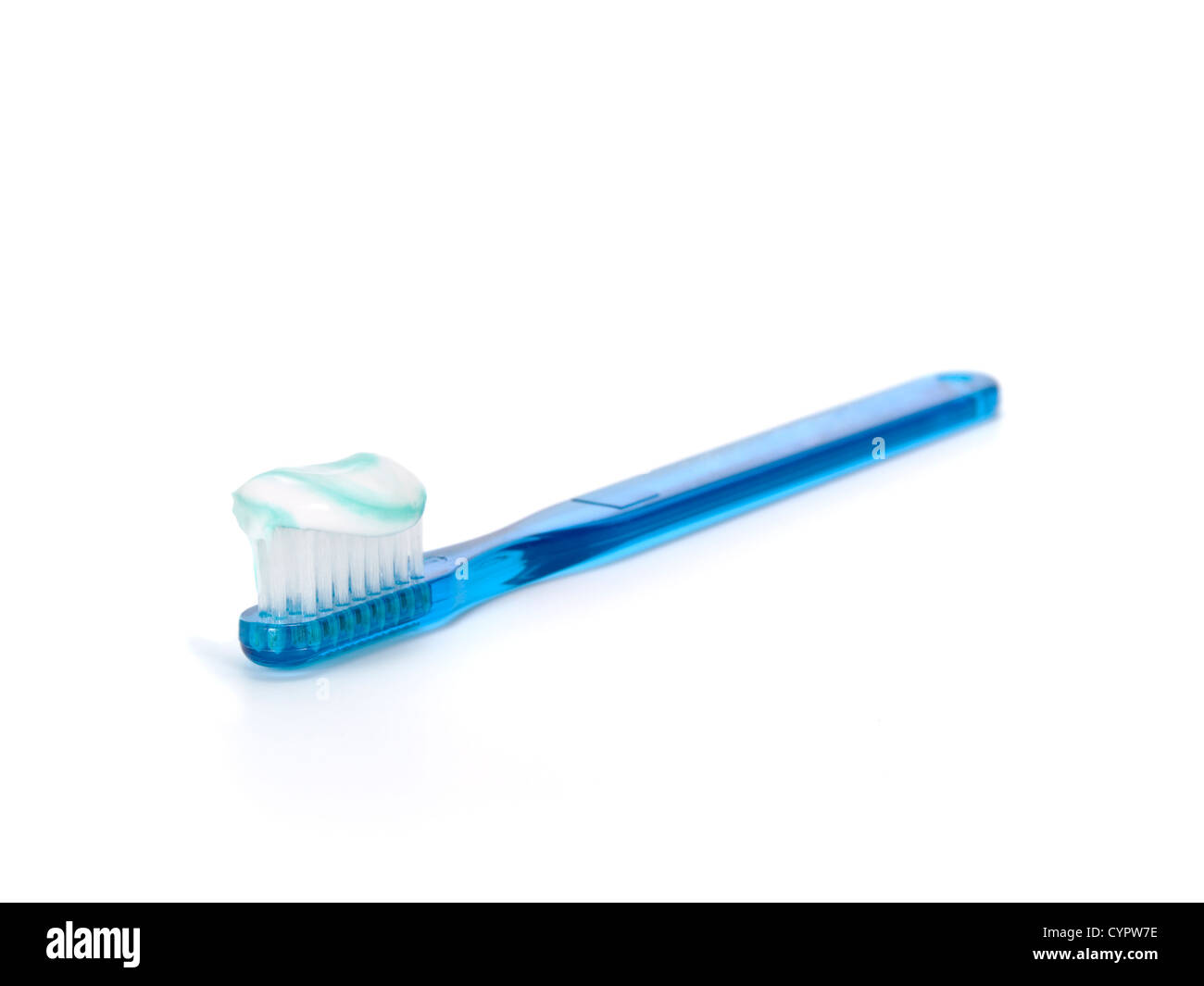 A blue toothbrush full of toothpaste isolated on white background Stock ...