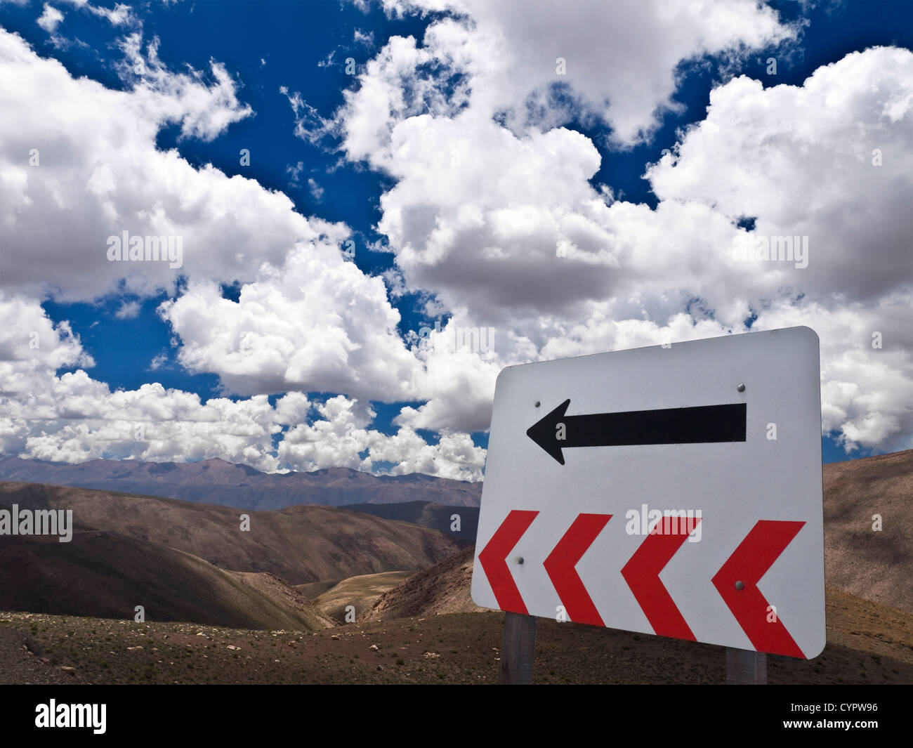 A TURN sign over the hill. Flip it to go right Stock Photo - Alamy