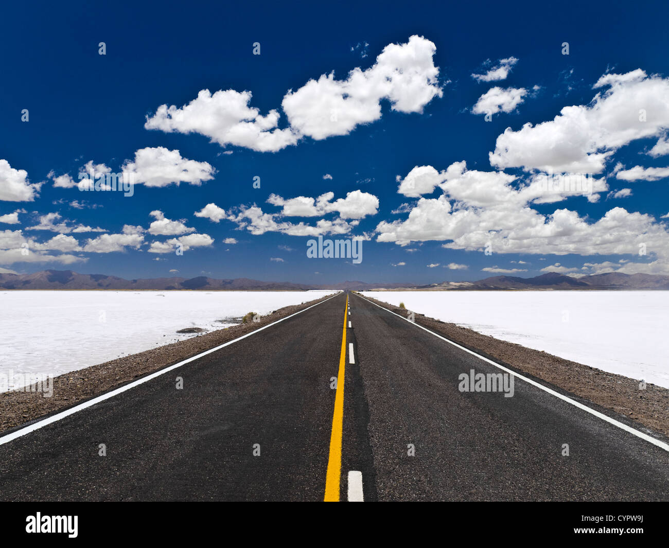 A straight road across an open salt mine Stock Photo - Alamy
