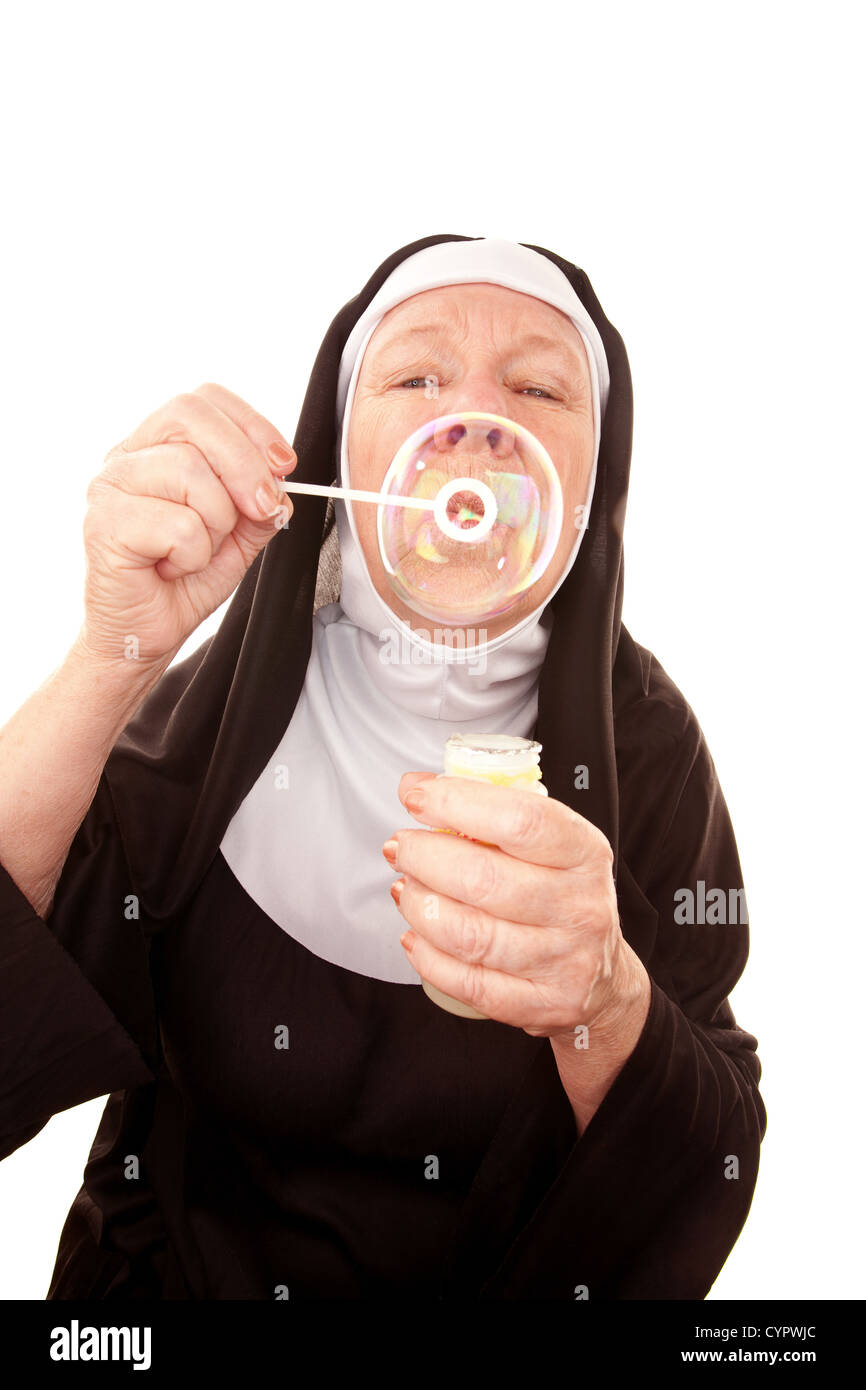 Funny Nun in Black Habit Blowing a Bubble Stock Photo - Alamy