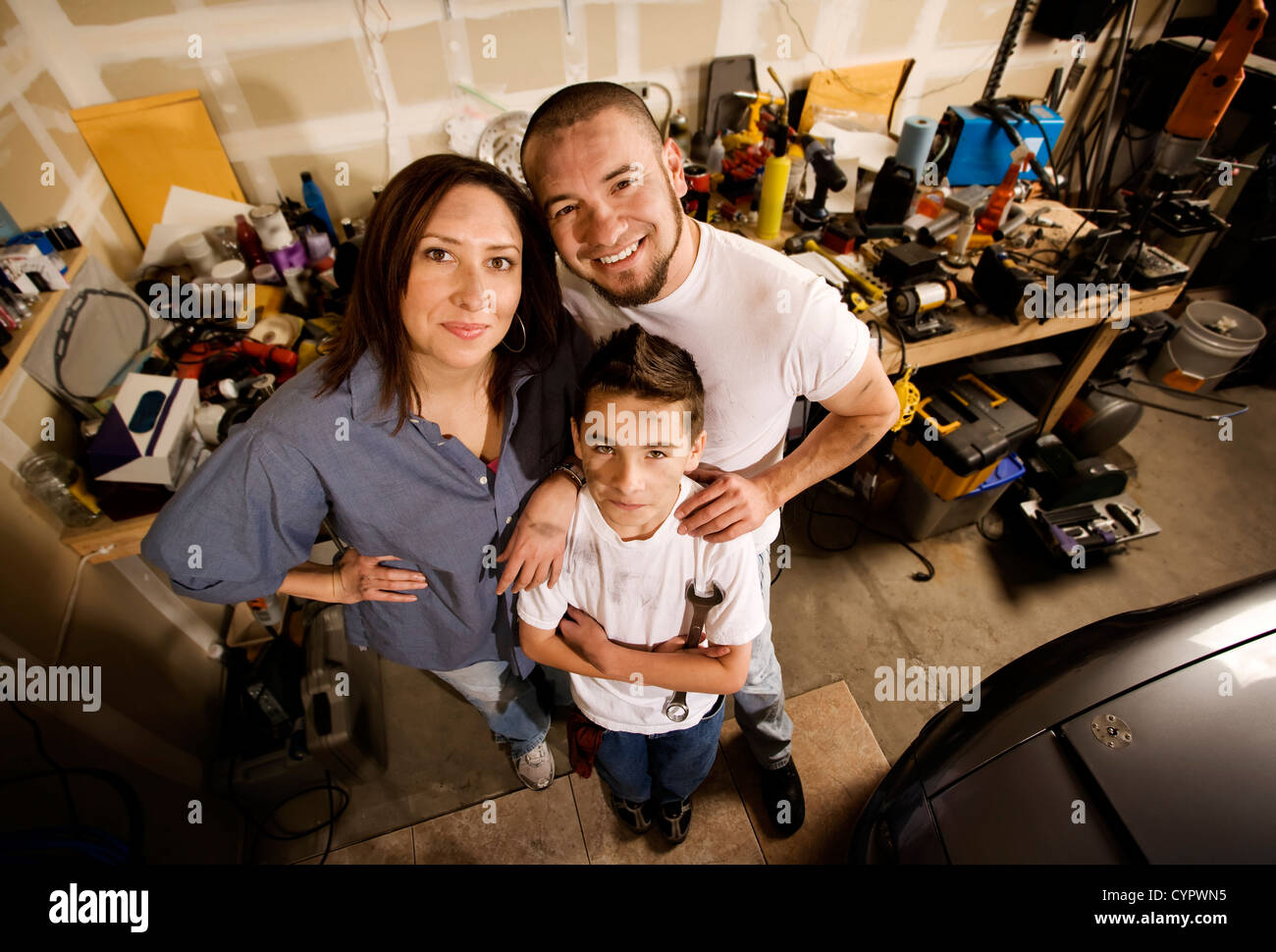 Do-it-yourself family in their garage Stock Photo - Alamy