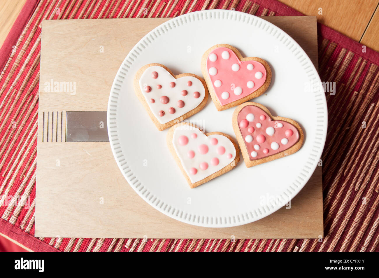 Pink heart shaped cookies beautifully decorated Stock Photo - Alamy