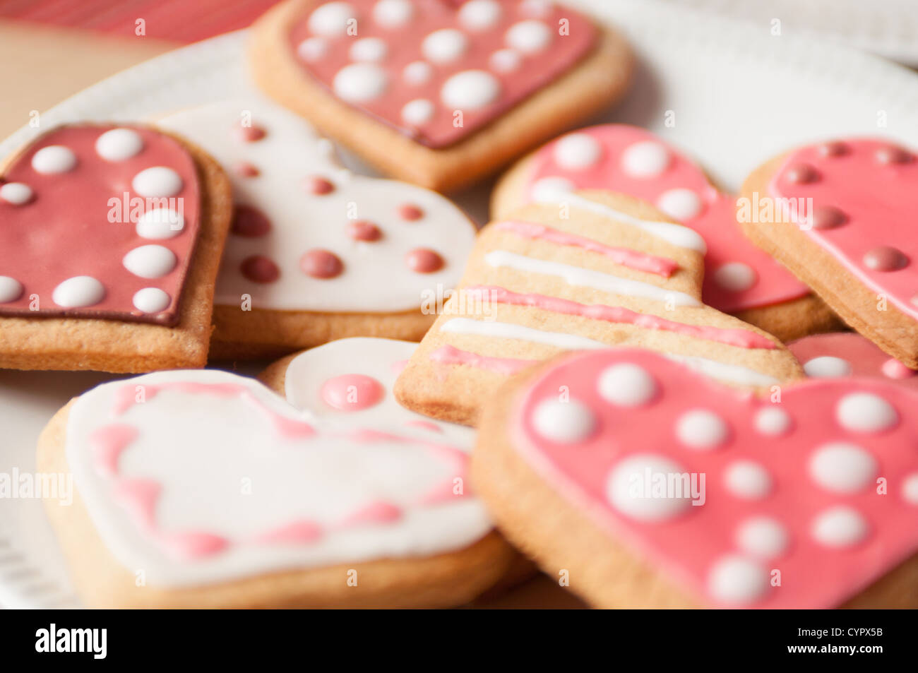 Pink heart shaped cookies beautifully decorated Stock Photo - Alamy